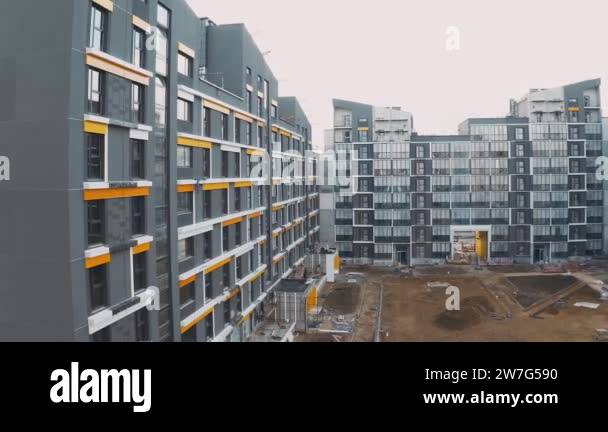 Construction site with scaffold, building work process modern an ...