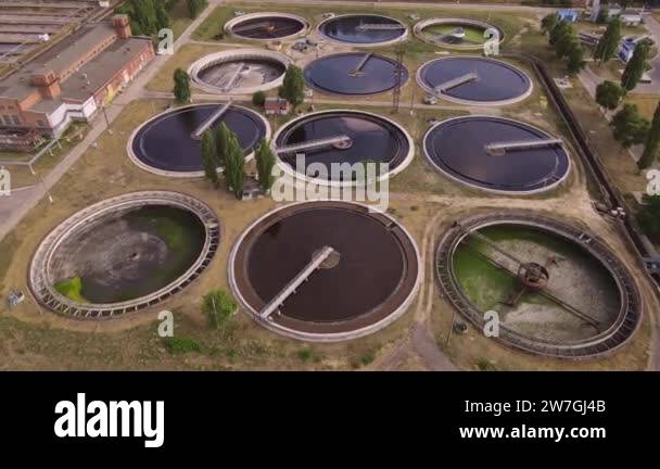 Circular clarifiers located at a massive sewage water cleaning facility ...