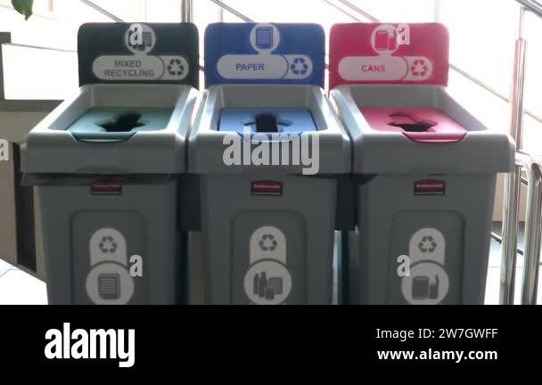 Close up of three public recycle bins. HDR. Waste segregation concept ...