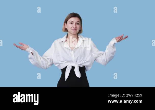 shrug gesture clueless woman whatever gif loop Stock Video Footage - Alamy