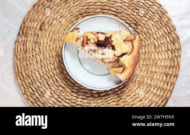 Stop motion animation. Pouring coffee with milk into a mug, next to a ...