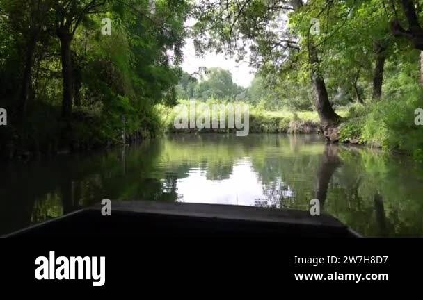 Sailing by boat on the natural water channels between La Garette and ...