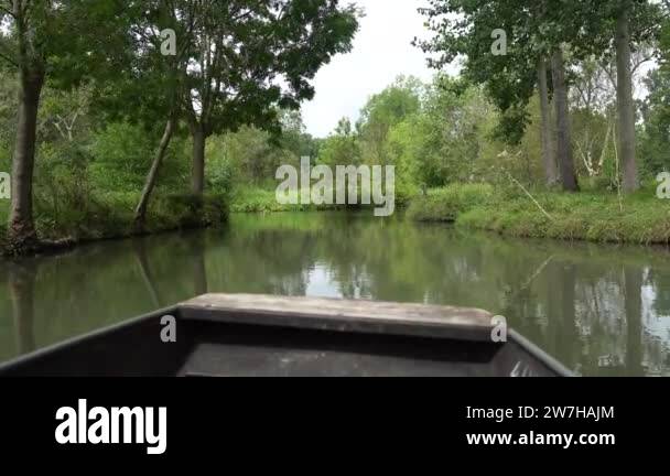 Sailing by boat on the natural water channels between La Garette and ...