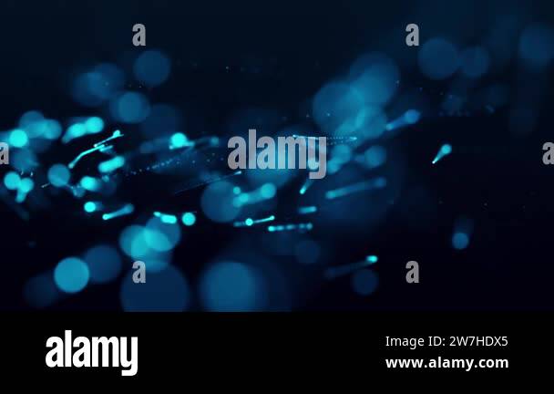 Wave of glow blue neon particles. Futuristic dots dynamic wave slow motion with bokeh background ...