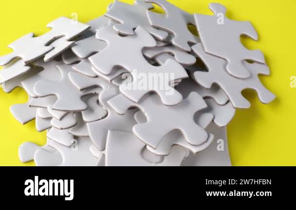 Plain white jigsaw puzzle Stock Videos & Footage - HD and 4K Video ...