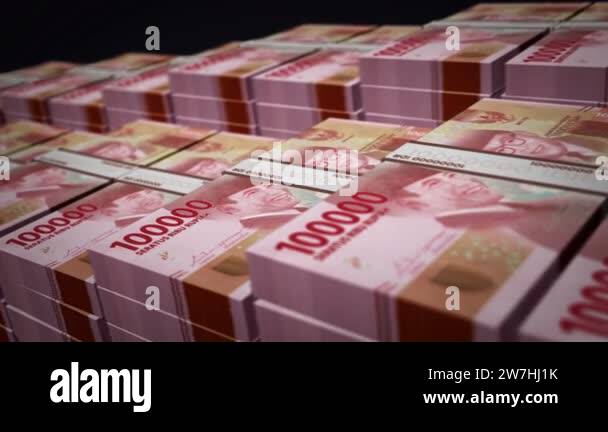 Indonesian Rupiah banknote bundle growth up loop. IDR money stacks ...