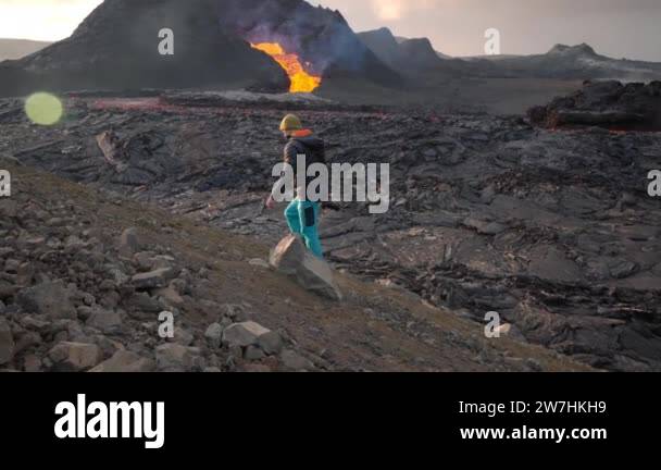 Photographer In Landscape With Lava Erupting From Fagradalsfjall ...