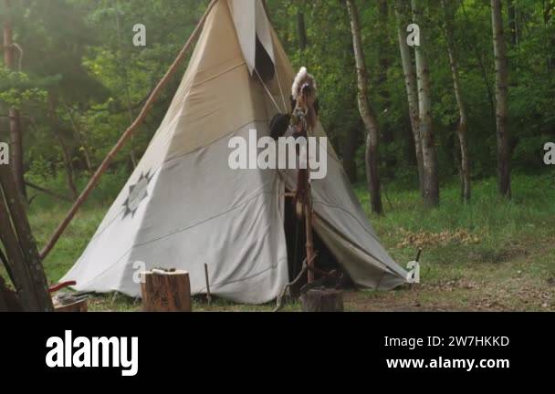 Forest home of the Indians. Wigwam indian teepee. The life of nomadic ...