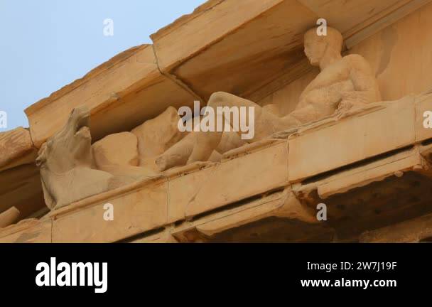 Ancient marble sculptures of man and horse decorating Parthenon temple ...