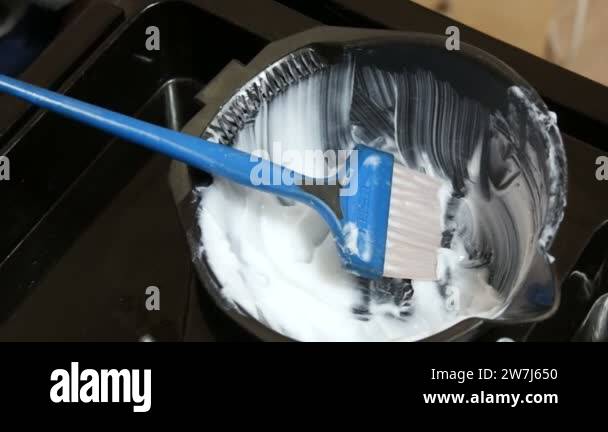 Hair dye container Stock Videos & Footage - HD and 4K Video Clips - Alamy