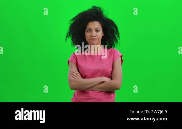 Young female African American resentfully waves his head no, then ...