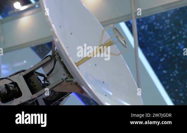 White rotating satellite dish antenna using to receive or transmit information Stock Video ...