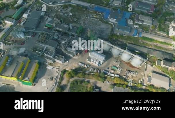 Flight over the industrial area. Many factories next to each other top ...