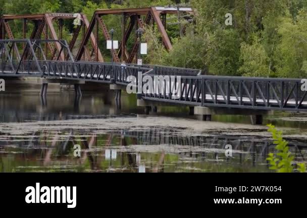 Sherbrooke, Canada - August 1, 2021: Footbridge at Lac-des-Nations park ...