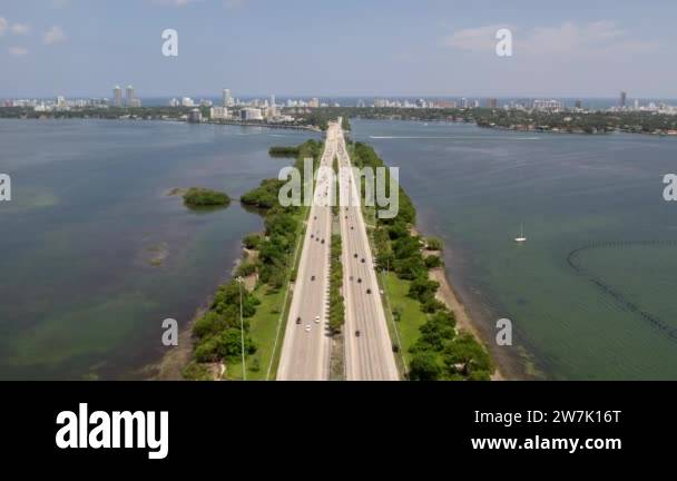 Slow flight Bridge over water Miami Julia Tuttle Causeway 4k Stock ...
