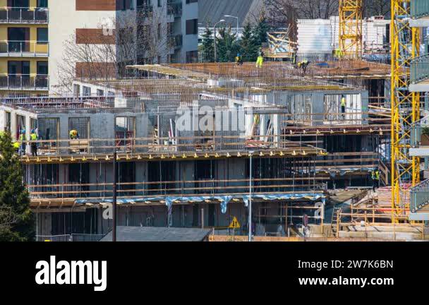 4k short timelapse footage of teamwork at construction site. Modern ...