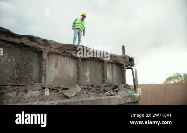 Bridge collapse. Destruction of structures across river with collapse ...