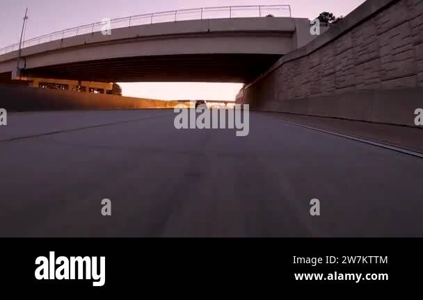 Augusta, Ga USA - 02 16 21: POV FPV driving low to the ground ramp to a ...