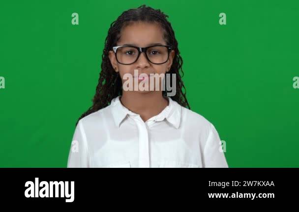 Dissatisfied nerd African American teen girl showing thumbs down on ...