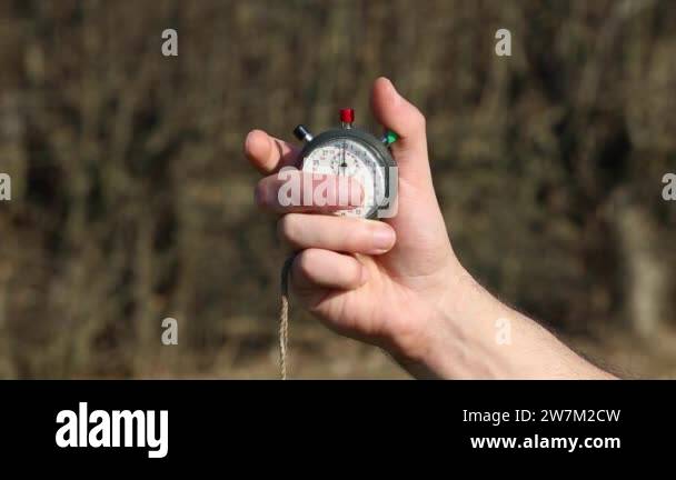 Stop watch in hand Stock Videos & Footage - HD and 4K Video Clips - Alamy