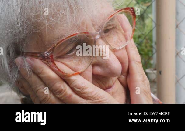 Portrait of grandmother with emotions and feelings. Old woman looking ...