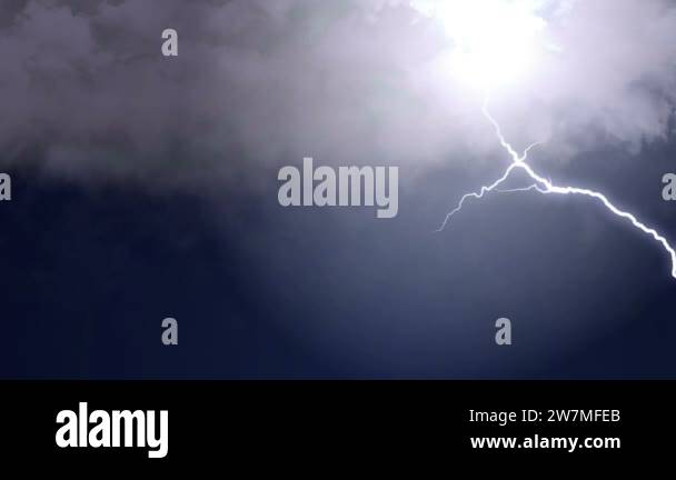 Severe thunderstorm and intense lightning in the night sky, loud ...