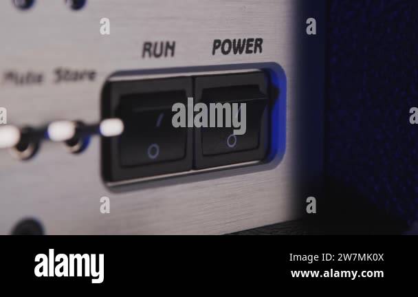 Tube guitar amp head switching on. A man is going to rock an audience ...