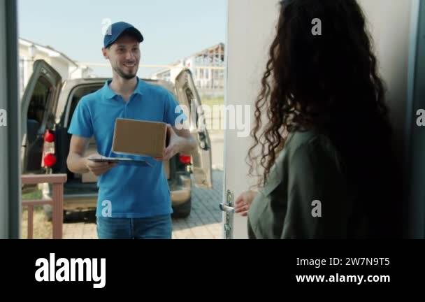 Postman parcel girl Stock Videos & Footage - HD and 4K Video Clips - Alamy