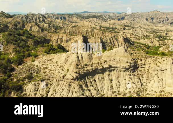 Left to right panning view rocky limestone mountain canyon, Stone ...