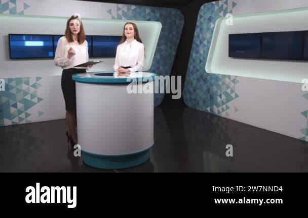 Female presenter interviewing a famous woman at tv studio Stock Video ...