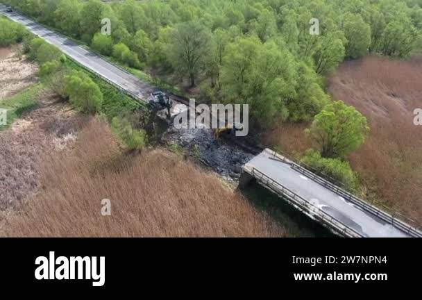 Traffic collapse. Road construction site, broken asphalt, bitumen layer ...