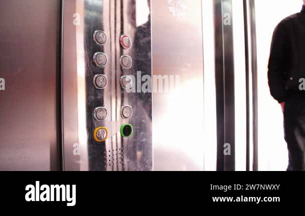 Presses a Button In An Elevator Stock Video Footage - Alamy