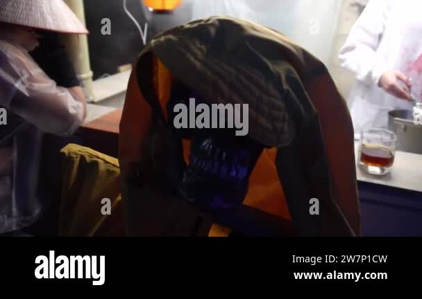 Cyberpunk future concept. Man with gun aims at bionic cyborgs face at ...