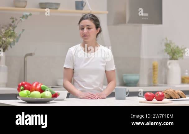 Indian Woman Shaking Head as Yes Sign while in Kitchen Stock Video ...