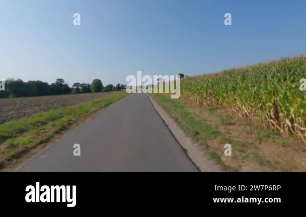 Agribusiness and agriculture, farmland in France Brittany region. Green ...