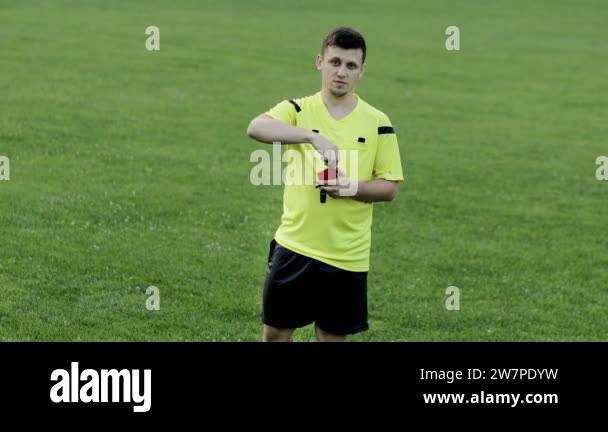 Soccer referee shows yellow card . Concept of sport, rules violation ...