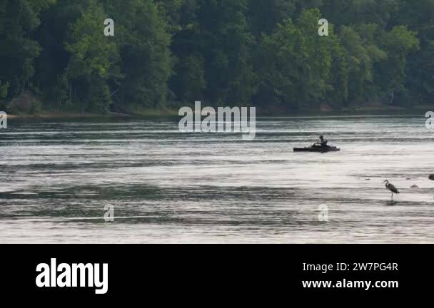 Man wading through water Stock Videos & Footage - HD and 4K Video Clips ...