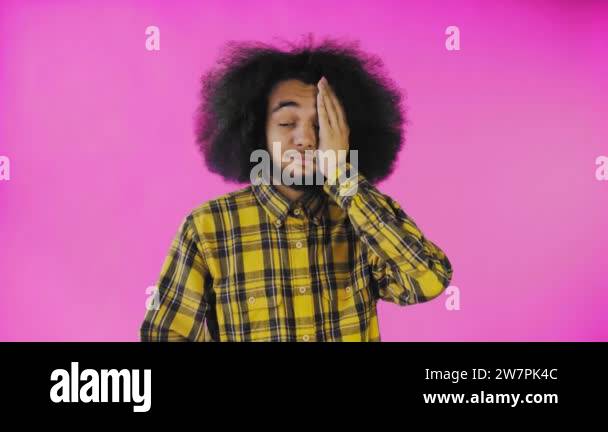 The portrait of a young man making a face gesture, as if there is no, I ...