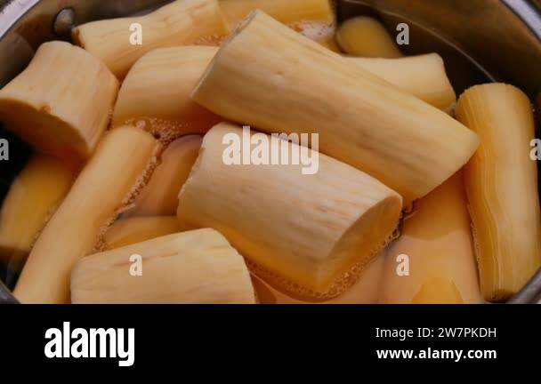 Boiled cassava in boiling water with sugar to making Thai dessert ...