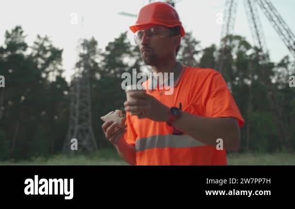 Construction worker on lunch break. Technician engineer man in hard hat ...