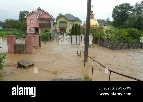Flooding in the village. Flooded house. Flooded homes and plots of land ...