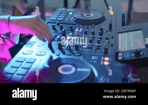 Close up. DJ sound control console for mixing dance music in disco club ...