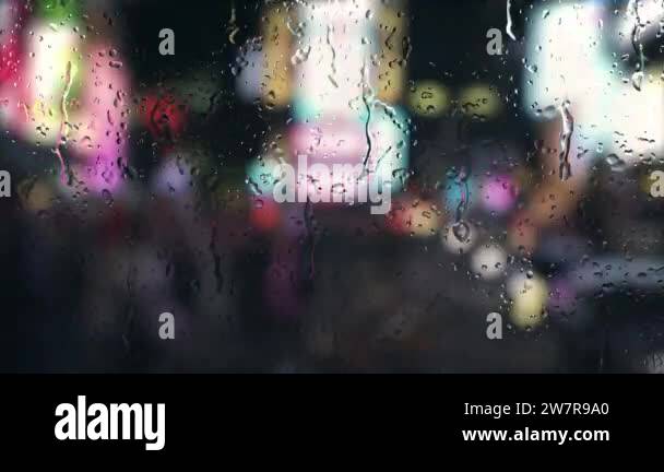 Rainfall in Time Square New York view from the window. Rain drops ...