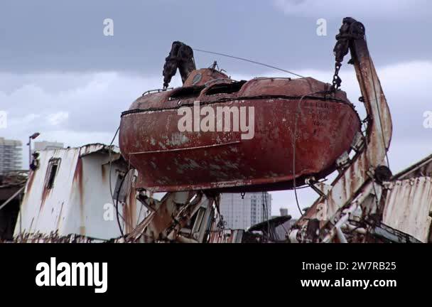 An Old Rusty Lifeboat For Emergency Evacuation from Sinking Ship at the ...