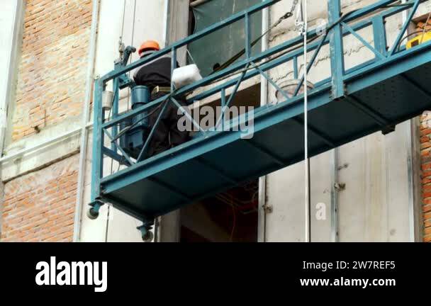 Industrial worker welding of metal structures, welder man male worker ...