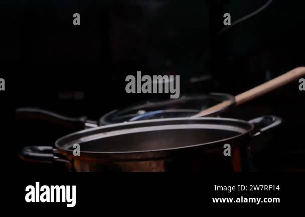 Boiled cassava in a pot with boiling water to making Thai dessert ...