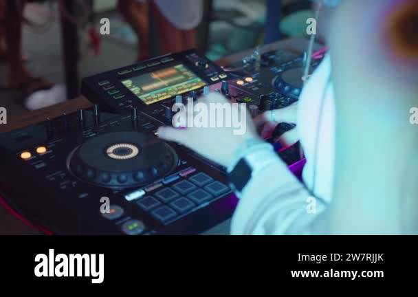 Close up. DJ sound control console for mixing dance music in disco club ...