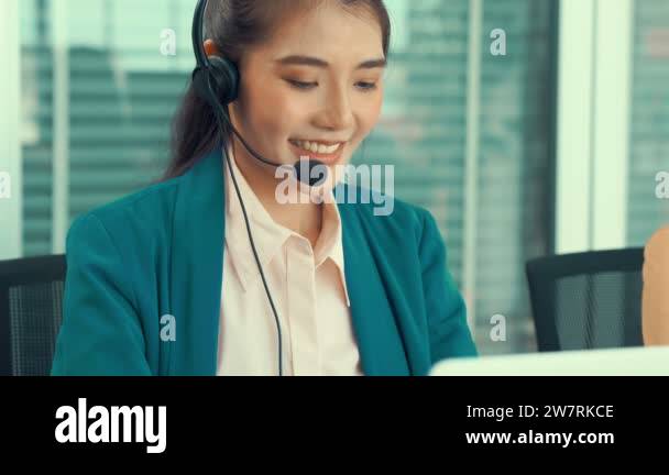 Receptionist wearing headset working Stock Videos & Footage - HD and 4K ...