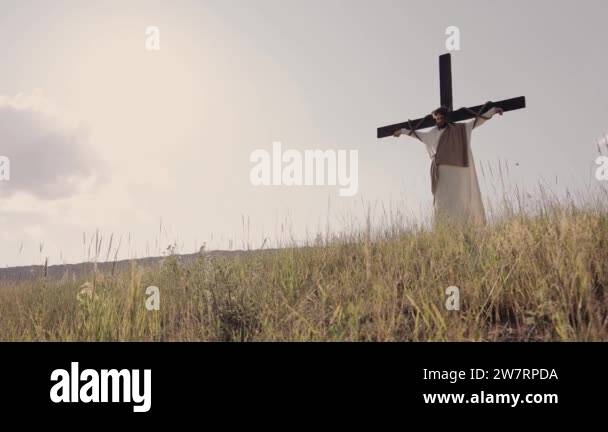 Jesus crucified on the cross, the wind is blowing. Crown of thorns ...