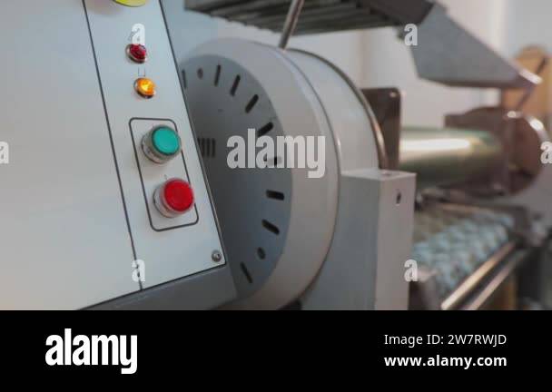A man pushes buttons on a dashboard, close up. White man hand pushing ...